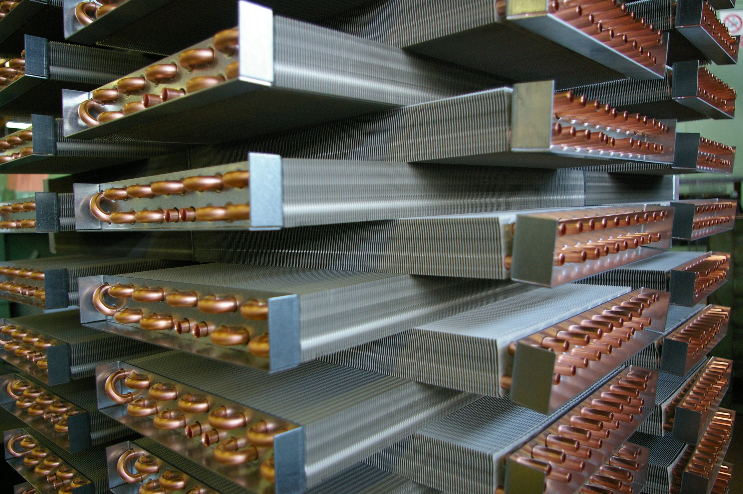 Applications of cooling coils in an industrial cooling system